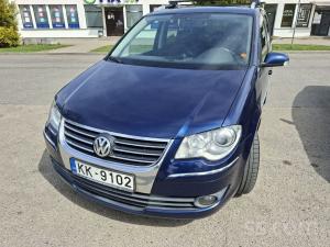 Zils Volkswagen Touran 2009 Rīga, ar dzinēja tilpumu 2.00 L un nobraukumu 350 tūkst. km par 2500 €, foto  vietnē AUTOMOTO.COM.LV