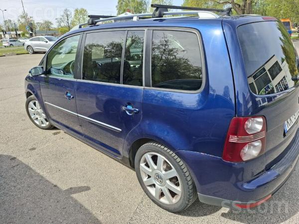 Zils Volkswagen Touran 2009 Rīga, ar dzinēja tilpumu 2.00 L un nobraukumu 350 tūkst. km par 2500 €, foto 2 vietnē AUTOMOTO.COM.LV