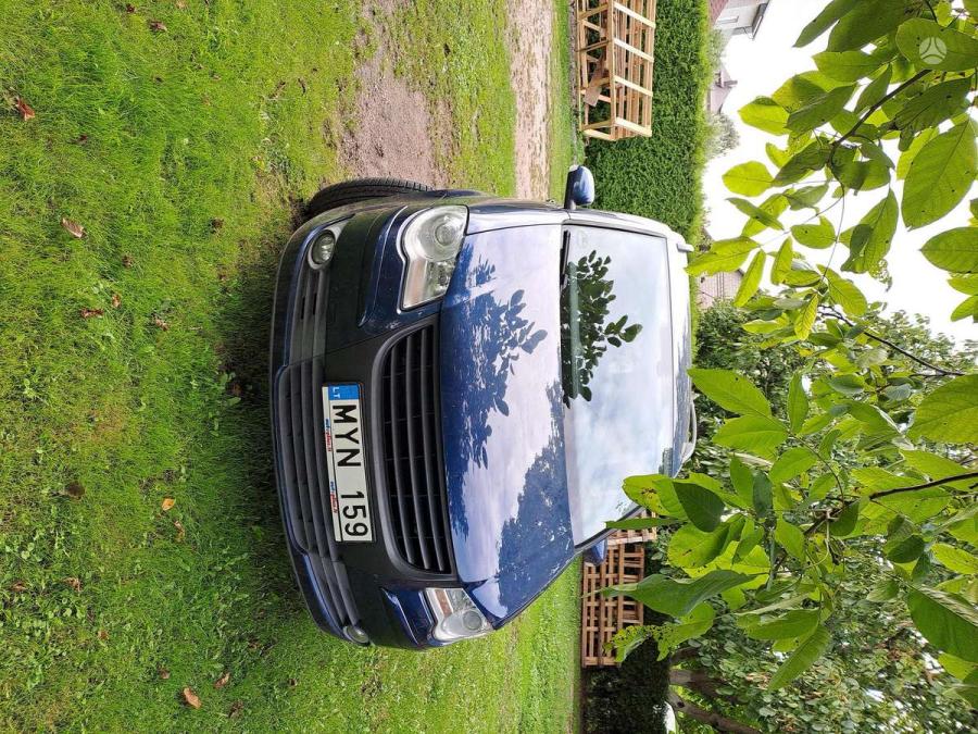 Blue Volkswagen Touran 2009 in Kaunas, with an engine capacity of 1.39 L and mileage of 310 thousand km for 3000 €, photo 1 on AUTOMOTO.COM.LV