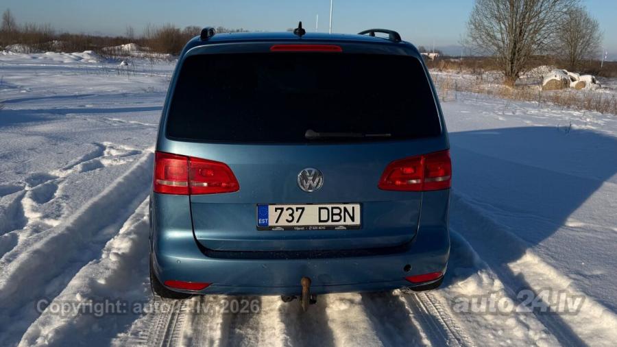 Blue Volkswagen Touran 2010 in Tallinn, with an engine capacity of 2.00 L and mileage of 423 thousand km for 3499 €, photo 2 on AUTOMOTO.COM.LV