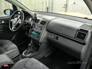 Zils Volkswagen Touran 2012 Viljandi, ar dzinēja tilpumu 1.40 L un nobraukumu 138 tūkst. km par 6390 €, foto 4 vietnē AUTOMOTO.COM.LV