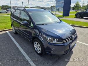 Blue Volkswagen Touran 2012 in Tallinn, with an engine capacity of 1.40 L and mileage of 283 thousand km for 5200 €, photo  on AUTOMOTO.COM.LV