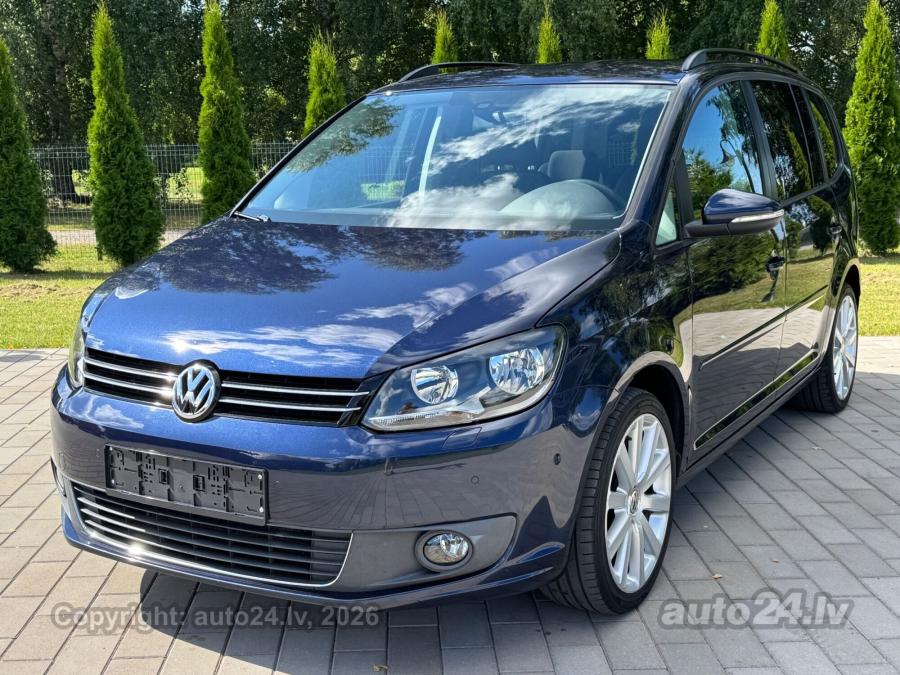 Blue Volkswagen Touran 2012 in Tartu, with an engine capacity of 1.20 L and mileage of 239 thousand km for 7490 €, photo 1 on AUTOMOTO.COM.LV