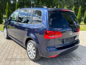 Blue Volkswagen Touran 2012 in Tartu, with an engine capacity of 1.20 L and mileage of 239 thousand km for 7490 €, photo 3 on AUTOMOTO.COM.LV