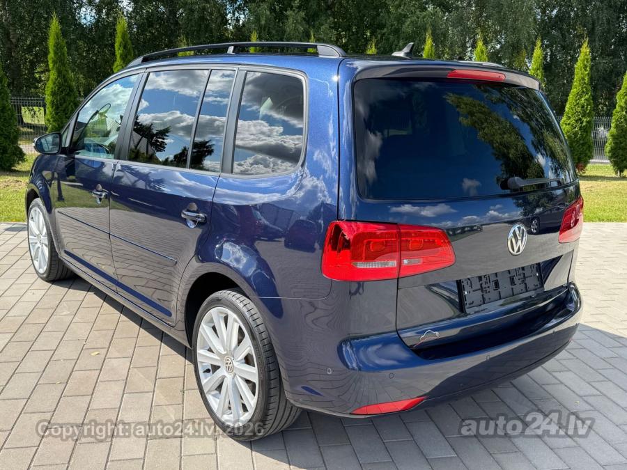 Blue Volkswagen Touran 2012 in Tartu, with an engine capacity of 1.20 L and mileage of 239 thousand km for 7490 €, photo 3 on AUTOMOTO.COM.LV