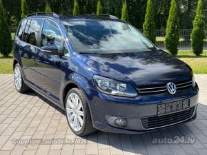 Blue Volkswagen Touran 2012 in Tartu, with an engine capacity of 1.20 L and mileage of 239 thousand km for 7490 €, photo 4 on AUTOMOTO.COM.LV