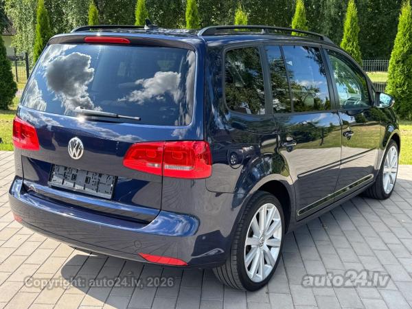 Blue Volkswagen Touran 2012 in Tartu, with an engine capacity of 1.20 L and mileage of 239 thousand km for 7490 €, photo 4 on AUTOMOTO.COM.LV