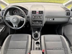Blue Volkswagen Touran 2012 in Tartu, with an engine capacity of 1.20 L and mileage of 239 thousand km for 7490 €, photo 6 on AUTOMOTO.COM.LV