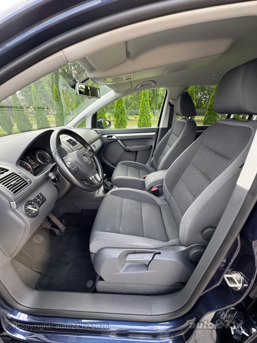 Blue Volkswagen Touran 2012 in Tartu, with an engine capacity of 1.20 L and mileage of 239 thousand km for 7490 €, photo 7 on AUTOMOTO.COM.LV