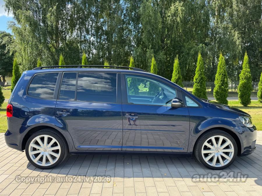 Blue Volkswagen Touran 2012 in Tartu, with an engine capacity of 1.20 L and mileage of 239 thousand km for 7490 €, photo 10 on AUTOMOTO.COM.LV