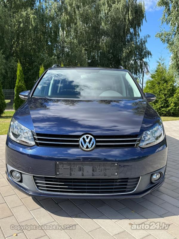 Blue Volkswagen Touran 2012 in Tartu, with an engine capacity of 1.20 L and mileage of 239 thousand km for 7490 €, photo 10 on AUTOMOTO.COM.LV