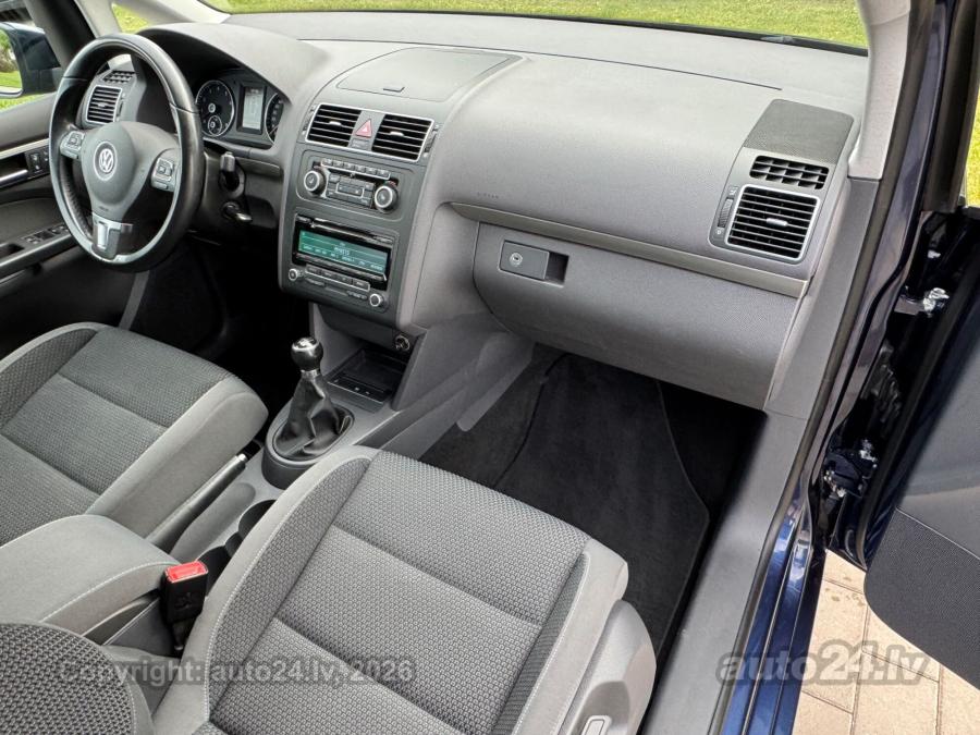 Blue Volkswagen Touran 2012 in Tartu, with an engine capacity of 1.20 L and mileage of 239 thousand km for 7490 €, photo 17 on AUTOMOTO.COM.LV