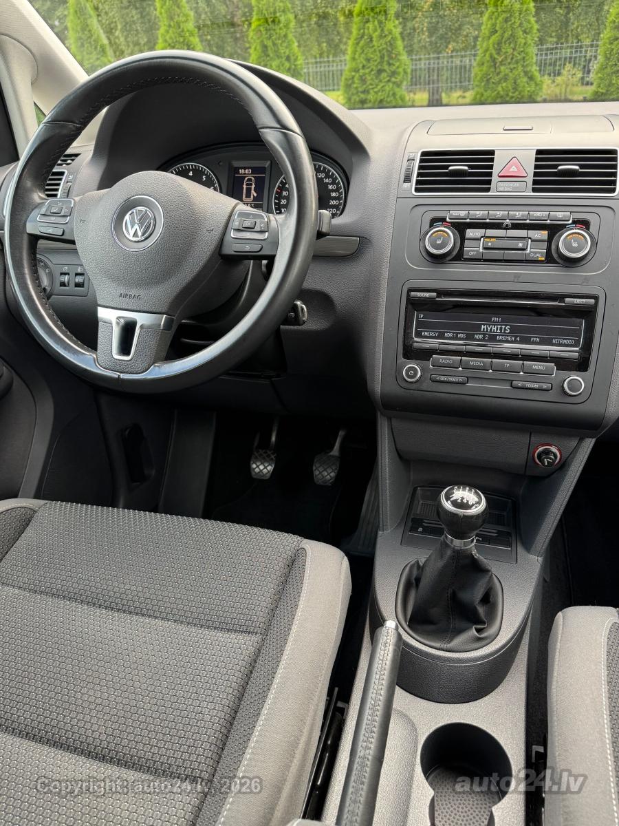 Blue Volkswagen Touran 2012 in Tartu, with an engine capacity of 1.20 L and mileage of 239 thousand km for 7490 €, photo 18 on AUTOMOTO.COM.LV