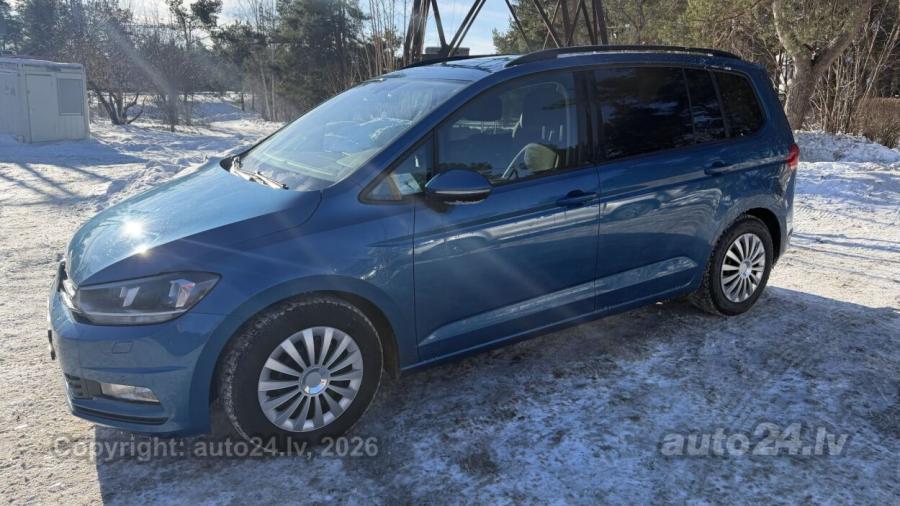 Zils Volkswagen Touran 2016 Tallina, ar dzinēja tilpumu 1.40 L un nobraukumu 166 tūkst. km par 11000 €, foto 1 vietnē AUTOMOTO.COM.LV