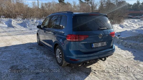 Blue Volkswagen Touran 2016 in Tallinn, with an engine capacity of 1.40 L and mileage of 166 thousand km for 11000 €, photo 3 on AUTOMOTO.COM.LV