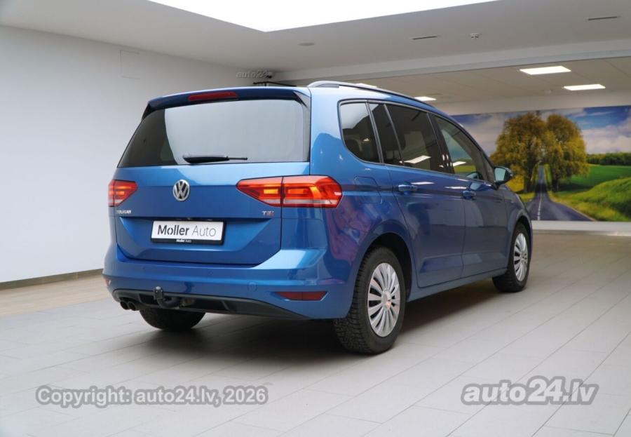 Blue Volkswagen Touran 2016 in Tallinn, with an engine capacity of 1.40 L and mileage of 0 thousand km for 13900 €, photo 4 on AUTOMOTO.COM.LV