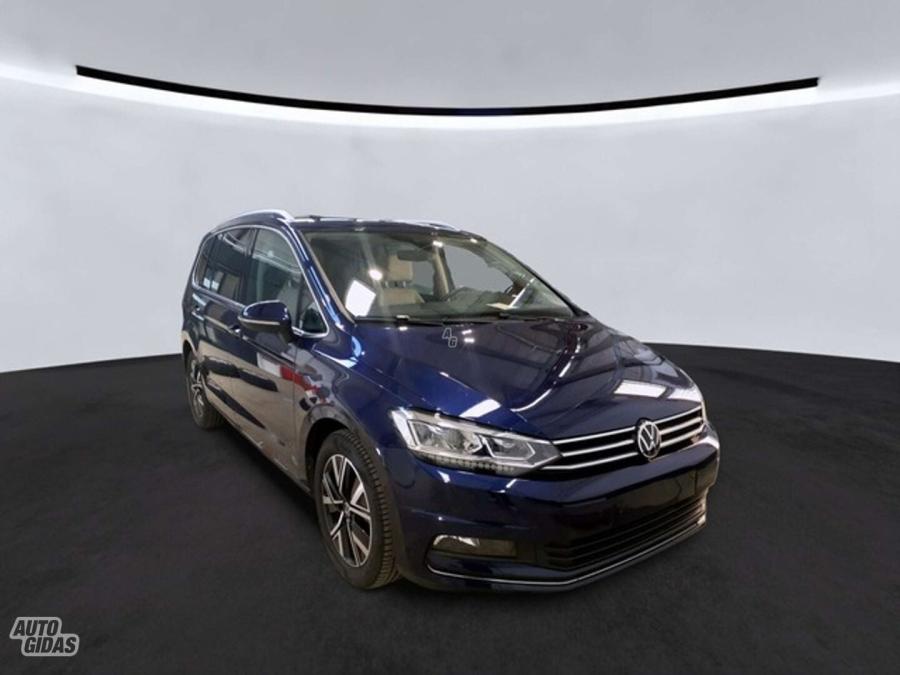 Blue Volkswagen Touran 2021 in Kaunas, with an engine capacity of 2.00 L and mileage of 77 thousand km for 31963 €, photo 1 on AUTOMOTO.COM.LV