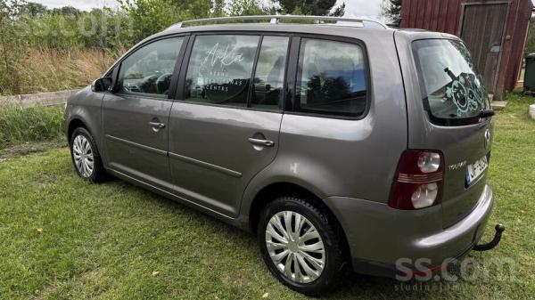 Brown Volkswagen Touran 2007 in Limbazi, with an engine capacity of 2.00 L and mileage of 329 thousand km for 2000 €, photo 2 on AUTOMOTO.COM.LV