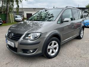 Brown Volkswagen Touran 2009 in Riga, with an engine capacity of 2.00 L and mileage of 0 thousand km for 3650 €, photo  on AUTOMOTO.COM.LV