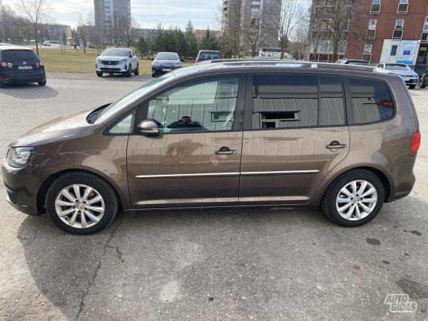 Brown Volkswagen Touran 2010 in Panevezys, with an engine capacity of 2.00 L and mileage of 363 thousand km for 4400 €, photo 2 on AUTOMOTO.COM.LV