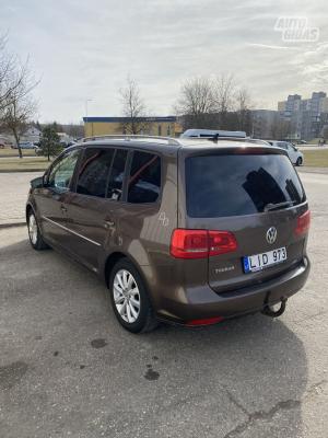 Brown Volkswagen Touran 2010 in Panevezys, with an engine capacity of 2.00 L and mileage of 363 thousand km for 4400 €, photo 4 on AUTOMOTO.COM.LV