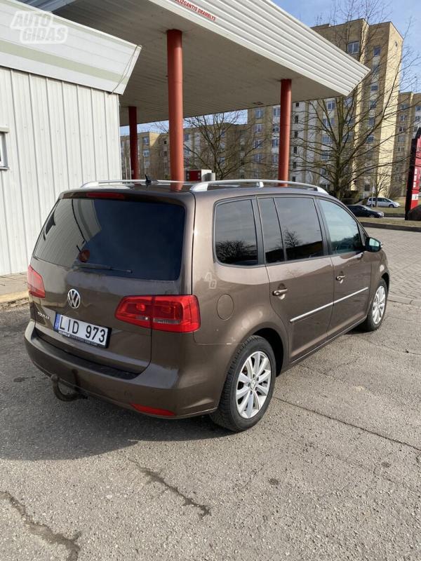 Brown Volkswagen Touran 2010 in Panevezys, with an engine capacity of 2.00 L and mileage of 363 thousand km for 4400 €, photo 5 on AUTOMOTO.COM.LV