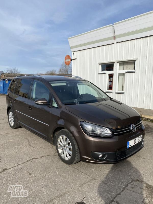 Brown Volkswagen Touran 2010 in Panevezys, with an engine capacity of 2.00 L and mileage of 363 thousand km for 4400 €, photo 7 on AUTOMOTO.COM.LV