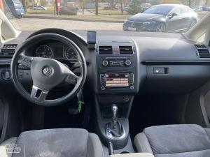Brown Volkswagen Touran 2010 in Panevezys, with an engine capacity of 2.00 L and mileage of 363 thousand km for 4400 €, photo 13 on AUTOMOTO.COM.LV