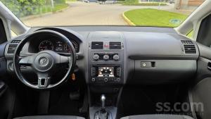 Brūns Volkswagen Touran 2010 Rīga, ar dzinēja tilpumu 1.60 L un nobraukumu 214 tūkst. km par 6660 €, foto 23 vietnē AUTOMOTO.COM.LV