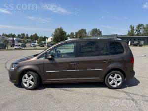 Brown Volkswagen Touran 2011 in Tukums, with an engine capacity of 2.00 L and mileage of 405 thousand km for 5700 €, photo 3 on AUTOMOTO.COM.LV