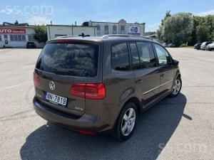 Brown Volkswagen Touran 2011 in Tukums, with an engine capacity of 2.00 L and mileage of 405 thousand km for 5700 €, photo 6 on AUTOMOTO.COM.LV