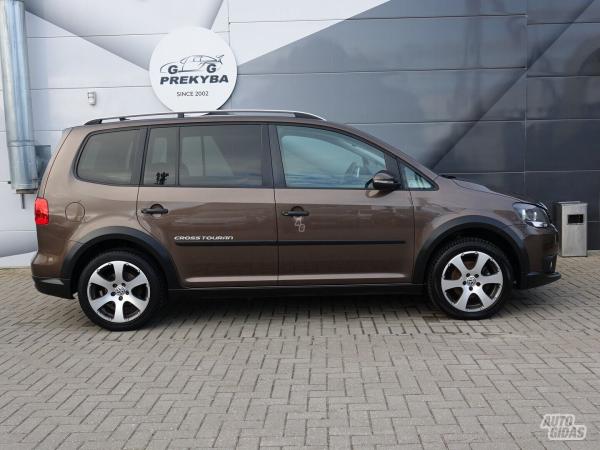 Brown Volkswagen Touran 2011 in Ramuciai, with an engine capacity of 1.40 L and mileage of 201 thousand km for 6550 €, photo 5 on AUTOMOTO.COM.LV