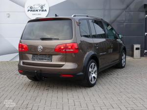 Brown Volkswagen Touran 2011 in Ramuciai, with an engine capacity of 1.40 L and mileage of 201 thousand km for 6550 €, photo 9 on AUTOMOTO.COM.LV