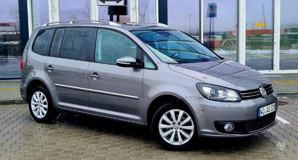 Brown Volkswagen Touran 2011 in Vilnius, with an engine capacity of 1.39 L and mileage of 236 thousand km for 6299 €, photo 4 on AUTOMOTO.COM.LV