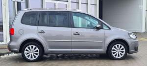 Brown Volkswagen Touran 2011 in Vilnius, with an engine capacity of 1.39 L and mileage of 236 thousand km for 6299 €, photo 8 on AUTOMOTO.COM.LV