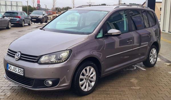 Brown Volkswagen Touran 2011 in Vilnius, with an engine capacity of 1.39 L and mileage of 236 thousand km for 6299 €, photo 10 on AUTOMOTO.COM.LV