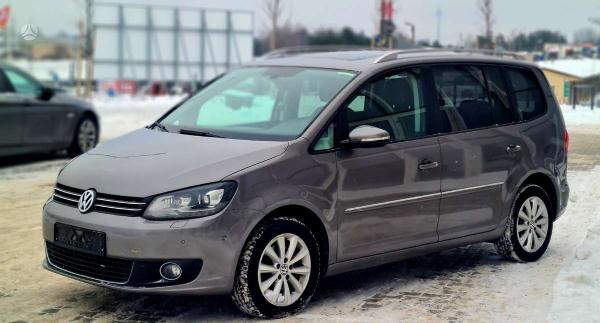 Brown Volkswagen Touran 2011 in Vilnius, with an engine capacity of 1.39 L and mileage of 236 thousand km for 6150 €, photo 8 on AUTOMOTO.COM.LV