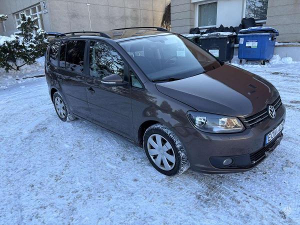 Brown Volkswagen Touran 2011 in Vilnius, with an engine capacity of 1.60 L and mileage of 274 thousand km for 6500 €, photo 5 on AUTOMOTO.COM.LV