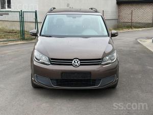 Brown Volkswagen Touran 2011 in Ludza, with an engine capacity of 1.60 L and mileage of 235 thousand km for 6450 €, photo  on AUTOMOTO.COM.LV