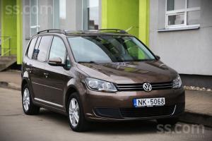 Brown Volkswagen Touran 2011 in Riga, with an engine capacity of 1.60 L and mileage of 305 thousand km for 4495 €, photo 5 on AUTOMOTO.COM.LV