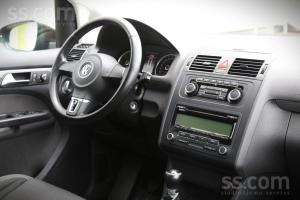 Brown Volkswagen Touran 2011 in Riga, with an engine capacity of 1.60 L and mileage of 305 thousand km for 4495 €, photo 12 on AUTOMOTO.COM.LV
