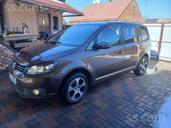 Brūns Volkswagen Touran 2011 Daugavpils, ar dzinēja tilpumu 2.00 L un nobraukumu 242 tūkst. km par 7300 €, foto 2 vietnē AUTOMOTO.COM.LV