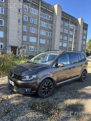 Brown Volkswagen Touran 2011 in Jekabpils, with an engine capacity of 1.60 L and mileage of 262 thousand km for 4500 €, photo 7 on AUTOMOTO.COM.LV