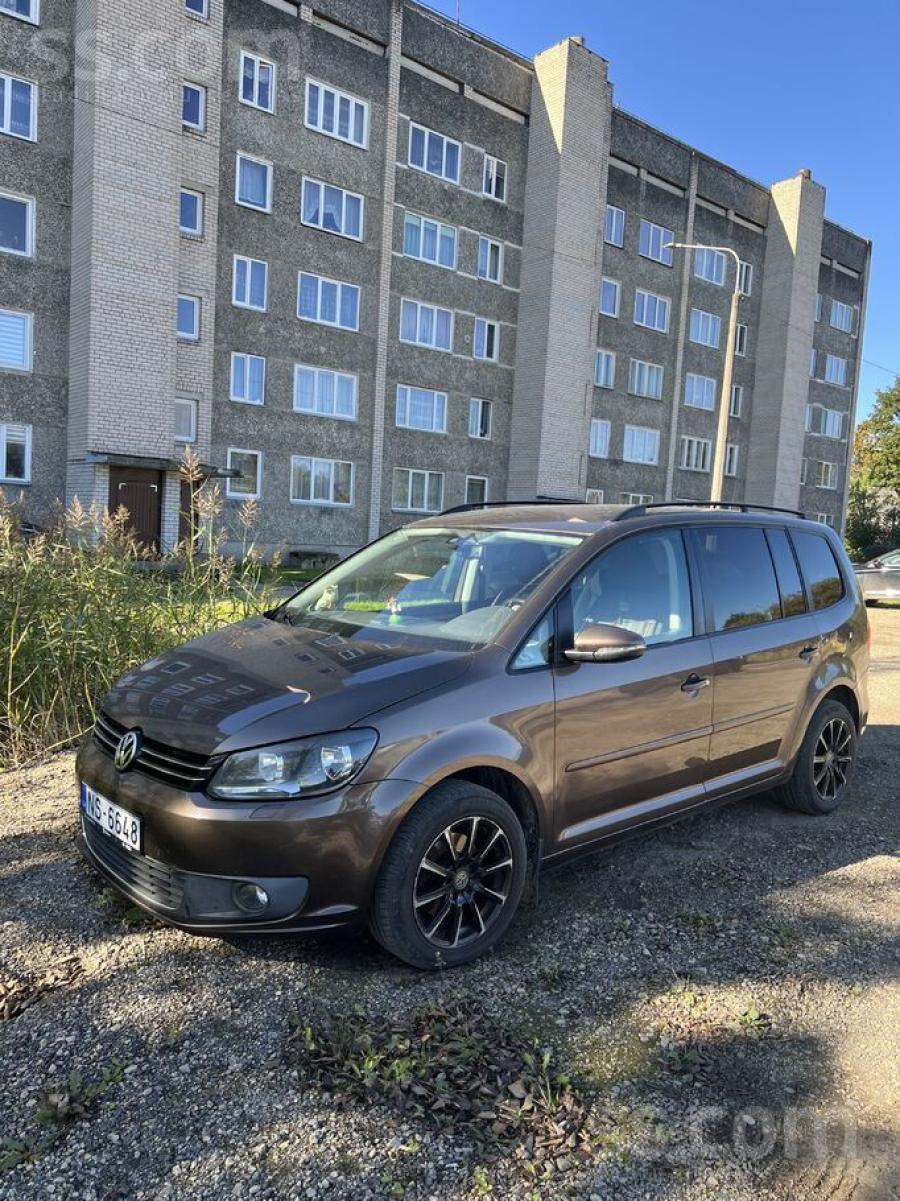 Brown Volkswagen Touran 2011 in Jekabpils, with an engine capacity of 1.60 L and mileage of 262 thousand km for 4500 €, photo 7 on AUTOMOTO.COM.LV