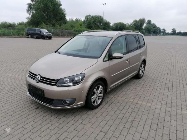 Brown Volkswagen Touran 2011 in Marijampole, with an engine capacity of 1.40 L and mileage of 215 thousand km for 3950 €, photo 1 on AUTOMOTO.COM.LV