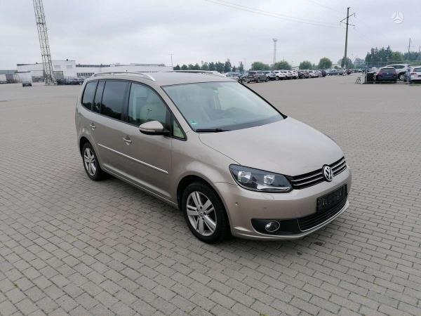 Brown Volkswagen Touran 2011 in Marijampole, with an engine capacity of 1.40 L and mileage of 215 thousand km for 3950 €, photo 3 on AUTOMOTO.COM.LV