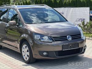 Brown Volkswagen Touran 2011 in Cesis, with an engine capacity of 1.40 L and mileage of 212 thousand km for 6500 €, photo  on AUTOMOTO.COM.LV