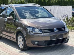 Brown Volkswagen Touran 2011 in Cesis, with an engine capacity of 1.40 L and mileage of 223 thousand km for 6500 €, photo  on AUTOMOTO.COM.LV