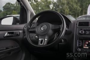 Brown Volkswagen Touran 2011 in Riga, with an engine capacity of 1.60 L and mileage of 272 thousand km for 6990 €, photo 12 on AUTOMOTO.COM.LV