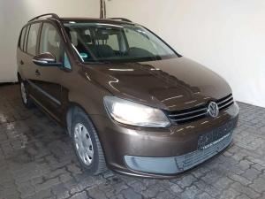 Brown Volkswagen Touran 2011 in Limbazi, with an engine capacity of 1.40 L and mileage of 280 thousand km for 5750 €, photo 4 on AUTOMOTO.COM.LV